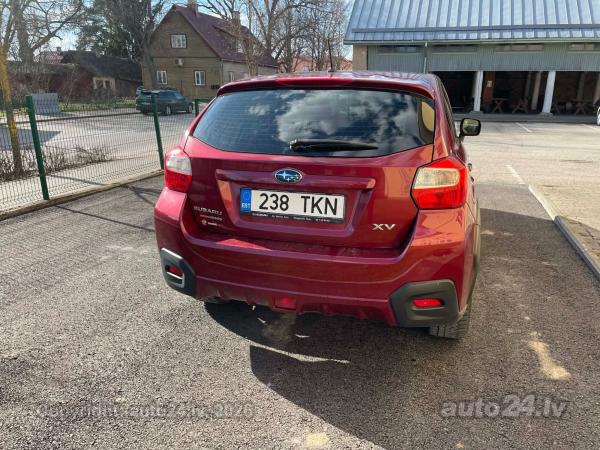 Red Subaru XV 2013 in Tallinn, with an engine capacity of 2.00 L and mileage of 105 thousand km for 8999 €, photo 5 on AUTOMOTO.COM.LV