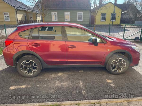 Red Subaru XV 2013 in Tallinn, with an engine capacity of 2.00 L and mileage of 105 thousand km for 8999 €, photo 6 on AUTOMOTO.COM.LV