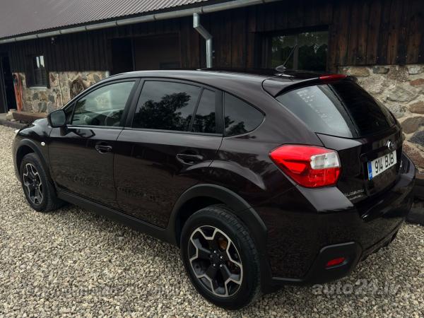 Red Subaru XV 2013 in Viljandi, with an engine capacity of 1.60 L and mileage of 115 thousand km for 9499 €, photo 4 on AUTOMOTO.COM.LV