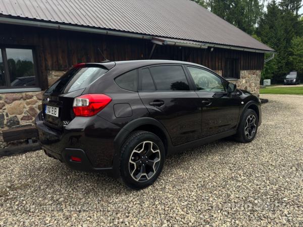 Red Subaru XV 2013 in Viljandi, with an engine capacity of 1.60 L and mileage of 115 thousand km for 9499 €, photo 5 on AUTOMOTO.COM.LV