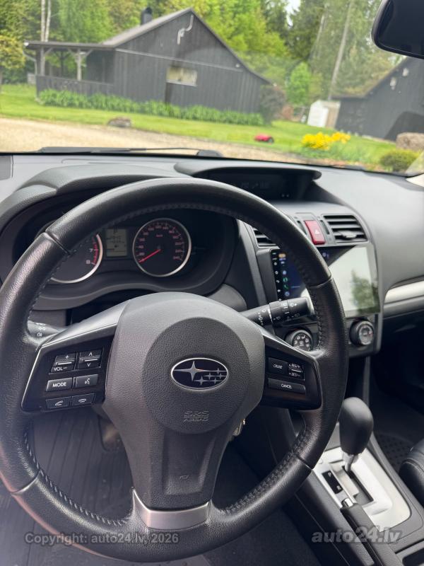 Red Subaru XV 2013 in Viljandi, with an engine capacity of 1.60 L and mileage of 115 thousand km for 9499 €, photo 8 on AUTOMOTO.COM.LV