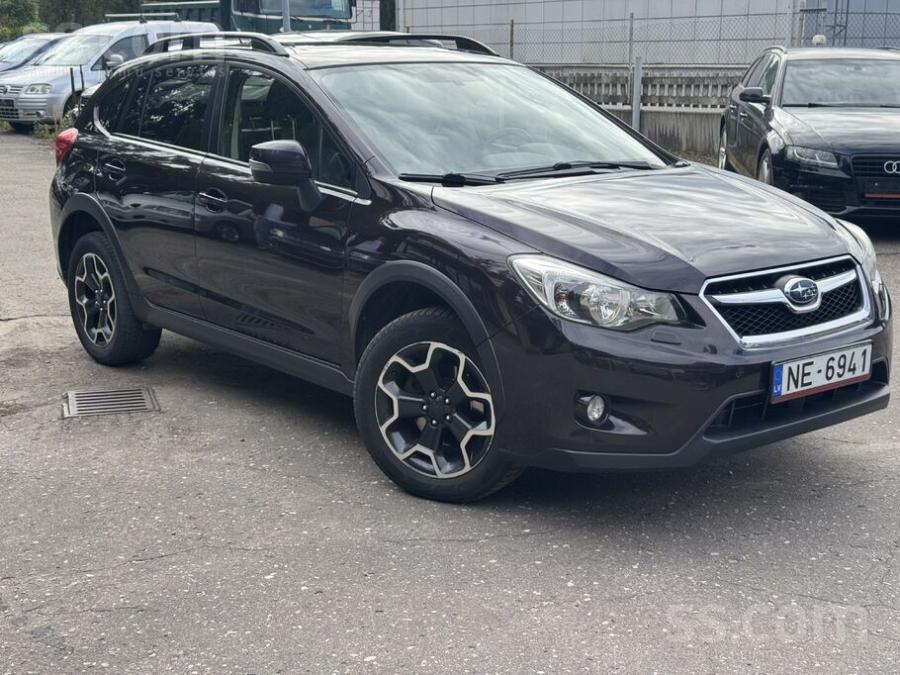 Violet Subaru XV 2012 in Riga, with an engine capacity of 2.00 L and mileage of 218 thousand km for 7950 €, photo 1 on AUTOMOTO.COM.LV