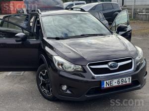 Violet Subaru XV 2012 in Riga, with an engine capacity of 2.00 L and mileage of 218 thousand km for 7950 €, photo 7 on AUTOMOTO.COM.LV