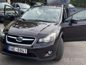 Violet Subaru XV 2012 in Riga, with an engine capacity of 2.00 L and mileage of 218 thousand km for 7950 €, photo 8 on AUTOMOTO.COM.LV