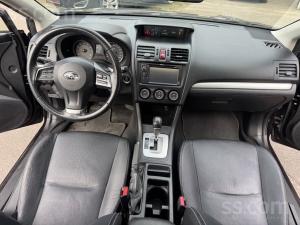 Violet Subaru XV 2012 in Riga, with an engine capacity of 2.00 L and mileage of 218 thousand km for 7950 €, photo 15 on AUTOMOTO.COM.LV