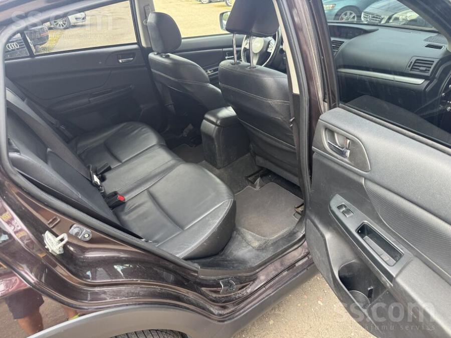 Violet Subaru XV 2012 in Riga, with an engine capacity of 2.00 L and mileage of 218 thousand km for 7950 €, photo 19 on AUTOMOTO.COM.LV