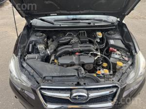 Violet Subaru XV 2012 in Riga, with an engine capacity of 2.00 L and mileage of 218 thousand km for 7950 €, photo 22 on AUTOMOTO.COM.LV