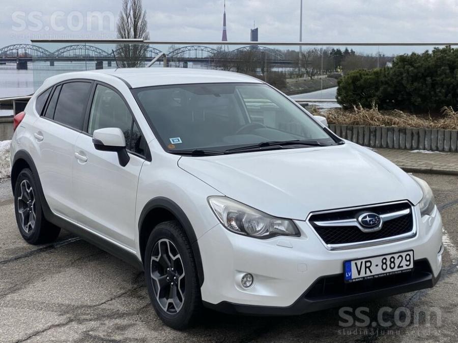 White Subaru XV 2012 in Riga, with an engine capacity of 2.00 L and mileage of 253 thousand km for 9750 €, photo 1 on AUTOMOTO.COM.LV