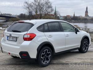 White Subaru XV 2012 in Riga, with an engine capacity of 2.00 L and mileage of 253 thousand km for 9750 €, photo 4 on AUTOMOTO.COM.LV