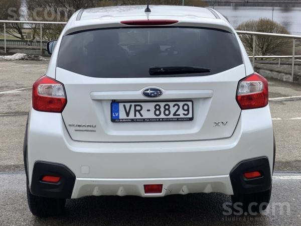 White Subaru XV 2012 in Riga, with an engine capacity of 2.00 L and mileage of 253 thousand km for 9750 €, photo 5 on AUTOMOTO.COM.LV