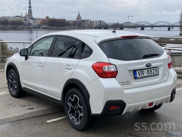 White Subaru XV 2012 in Riga, with an engine capacity of 2.00 L and mileage of 253 thousand km for 9750 €, photo 6 on AUTOMOTO.COM.LV