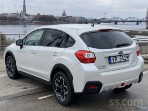 White Subaru XV 2012 in Riga, with an engine capacity of 2.00 L and mileage of 253 thousand km for 9750 €, photo 6 on AUTOMOTO.COM.LV