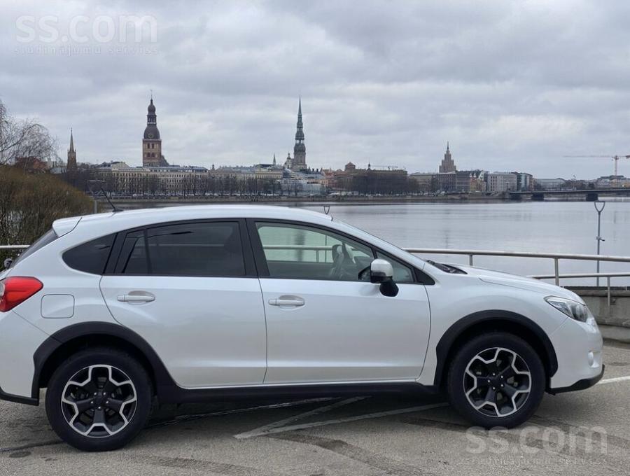 White Subaru XV 2012 in Riga, with an engine capacity of 2.00 L and mileage of 253 thousand km for 9750 €, photo 7 on AUTOMOTO.COM.LV