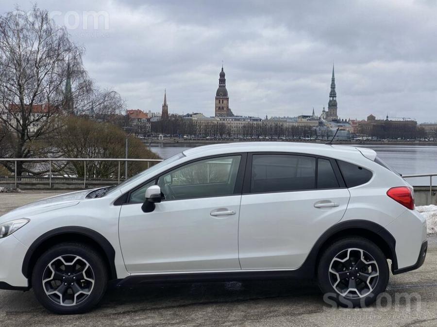 White Subaru XV 2012 in Riga, with an engine capacity of 2.00 L and mileage of 253 thousand km for 9750 €, photo 8 on AUTOMOTO.COM.LV