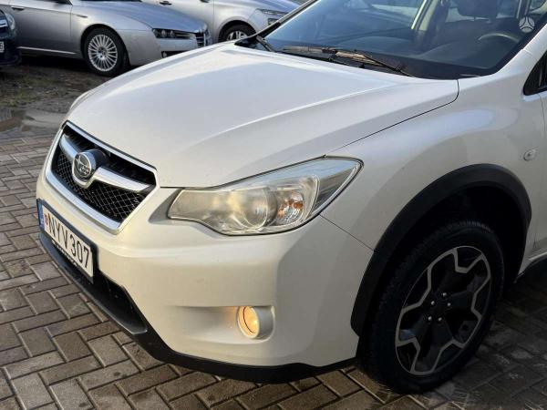 White Subaru XV 2012 in Vilnius, with an engine capacity of 2.00 L and mileage of 379 thousand km for 1450 €, photo 2 on AUTOMOTO.COM.LV