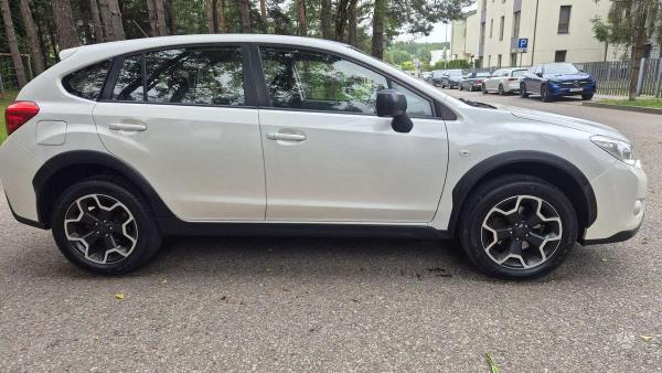 White Subaru XV 2012 in Vilnius, with an engine capacity of 2.00 L and mileage of 215 thousand km for 6500 €, photo 7 on AUTOMOTO.COM.LV