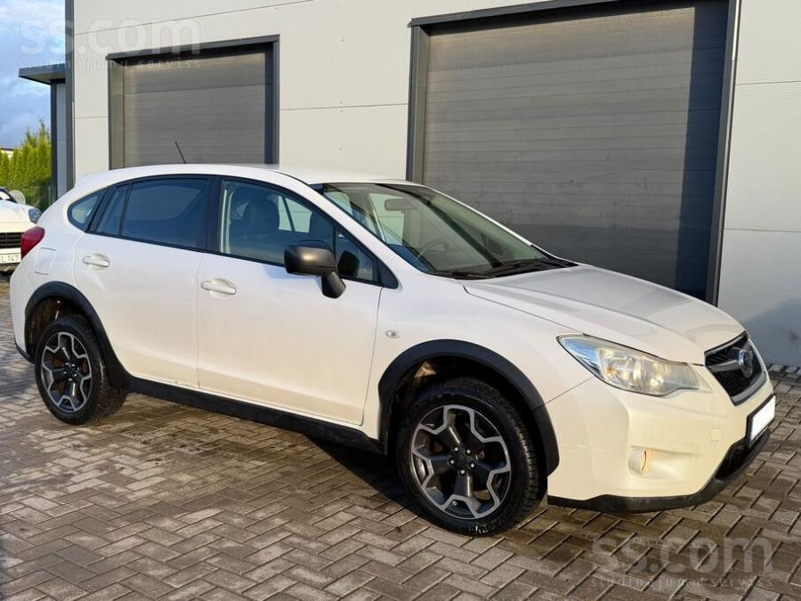 White Subaru XV 2012 in Riga, with an engine capacity of 2.00 L and mileage of 379 thousand km for 1520 €, photo 1 on AUTOMOTO.COM.LV
