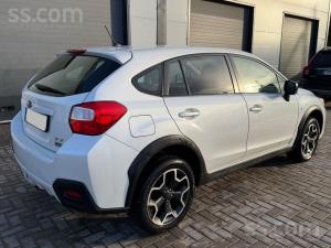 White Subaru XV 2012 in Riga, with an engine capacity of 2.00 L and mileage of 379 thousand km for 1520 €, photo 3 on AUTOMOTO.COM.LV