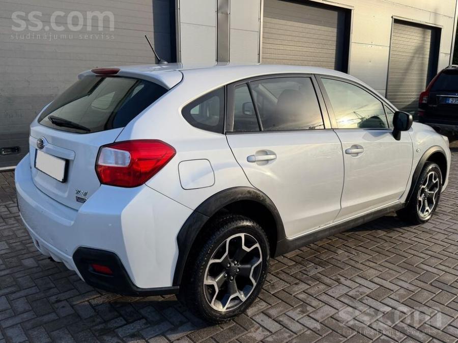 White Subaru XV 2012 in Riga, with an engine capacity of 2.00 L and mileage of 379 thousand km for 1520 €, photo 3 on AUTOMOTO.COM.LV