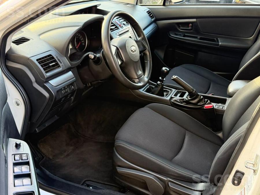 White Subaru XV 2012 in Riga, with an engine capacity of 2.00 L and mileage of 379 thousand km for 1520 €, photo 5 on AUTOMOTO.COM.LV