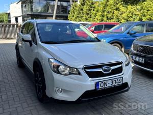 White Subaru XV 2014 in Riga, with an engine capacity of 2.00 L and mileage of 157 thousand km for 9400 €, photo 3 on AUTOMOTO.COM.LV