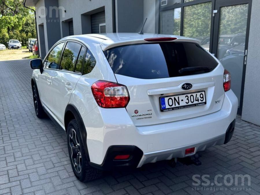 White Subaru XV 2014 in Riga, with an engine capacity of 2.00 L and mileage of 157 thousand km for 9400 €, photo 5 on AUTOMOTO.COM.LV