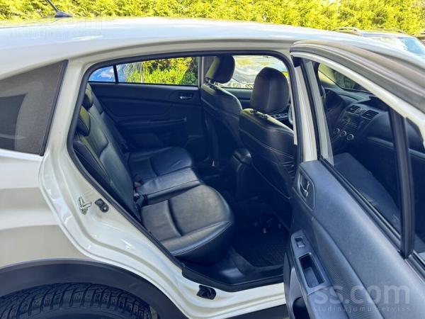 White Subaru XV 2014 in Riga, with an engine capacity of 2.00 L and mileage of 157 thousand km for 9400 €, photo 10 on AUTOMOTO.COM.LV