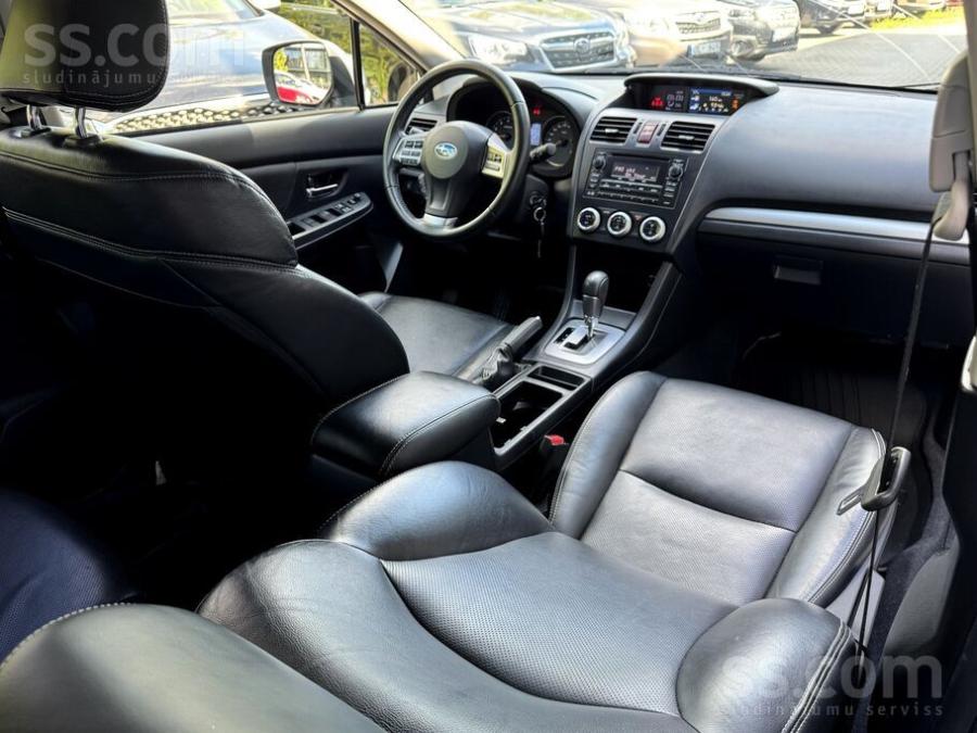 White Subaru XV 2014 in Riga, with an engine capacity of 2.00 L and mileage of 157 thousand km for 9400 €, photo 13 on AUTOMOTO.COM.LV