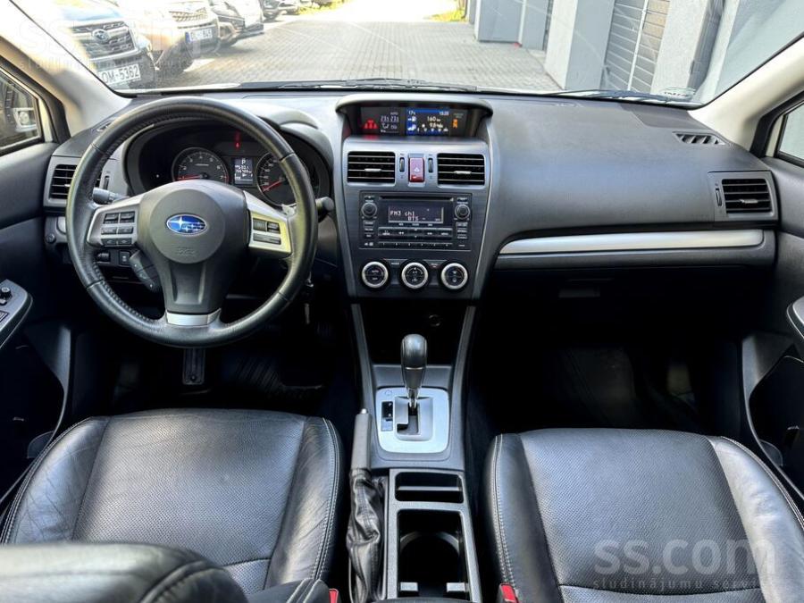 White Subaru XV 2014 in Riga, with an engine capacity of 2.00 L and mileage of 157 thousand km for 9400 €, photo 14 on AUTOMOTO.COM.LV