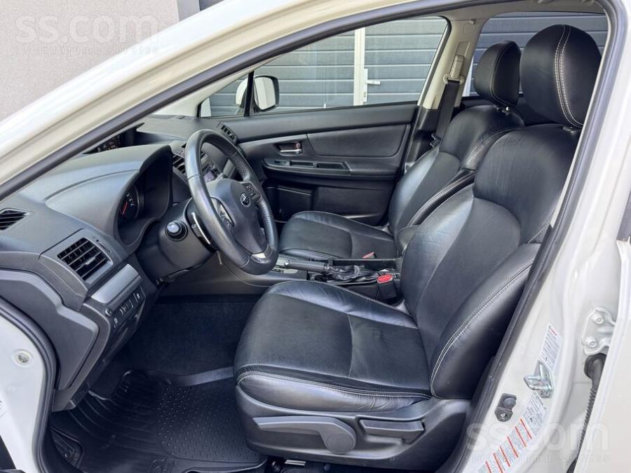 White Subaru XV 2014 in Riga, with an engine capacity of 2.00 L and mileage of 157 thousand km for 9400 €, photo 16 on AUTOMOTO.COM.LV