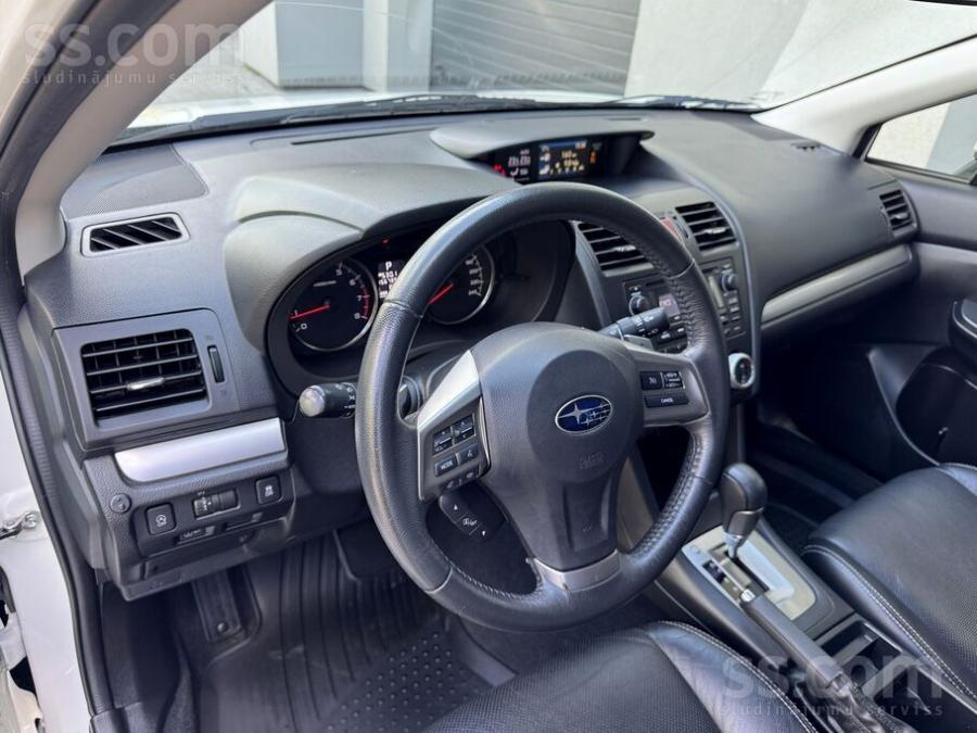 White Subaru XV 2014 in Riga, with an engine capacity of 2.00 L and mileage of 157 thousand km for 9400 €, photo 21 on AUTOMOTO.COM.LV