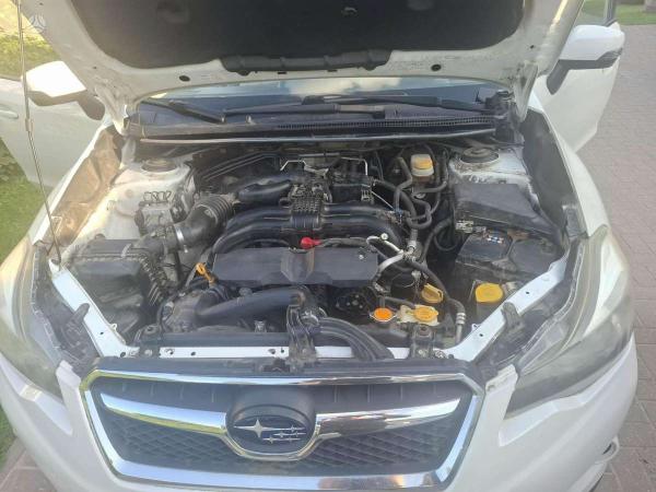 White Subaru XV 2014 in Kaunas, with an engine capacity of 2.00 L and mileage of 154 thousand km for 7300 €, photo 4 on AUTOMOTO.COM.LV