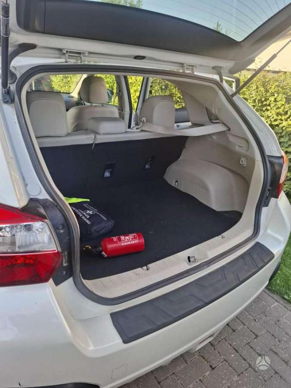 White Subaru XV 2014 in Kaunas, with an engine capacity of 2.00 L and mileage of 154 thousand km for 7300 €, photo 5 on AUTOMOTO.COM.LV