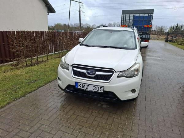 White Subaru XV 2014 in Kaunas, with an engine capacity of 2.00 L and mileage of 154 thousand km for 7300 €, photo 6 on AUTOMOTO.COM.LV