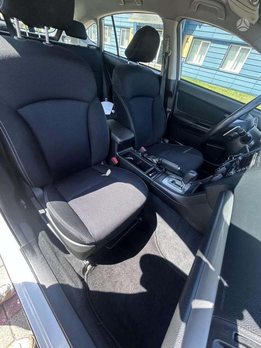 White Subaru XV 2014 in Vilnius, with an engine capacity of 2.00 L and mileage of 169 thousand km for 7499 €, photo 13 on AUTOMOTO.COM.LV