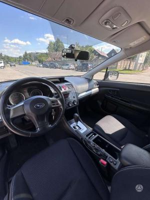 White Subaru XV 2014 in Vilnius, with an engine capacity of 2.00 L and mileage of 169 thousand km for 7499 €, photo 14 on AUTOMOTO.COM.LV