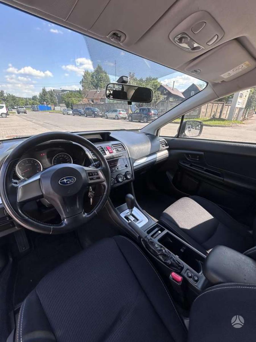 White Subaru XV 2014 in Vilnius, with an engine capacity of 2.00 L and mileage of 169 thousand km for 7499 €, photo 14 on AUTOMOTO.COM.LV