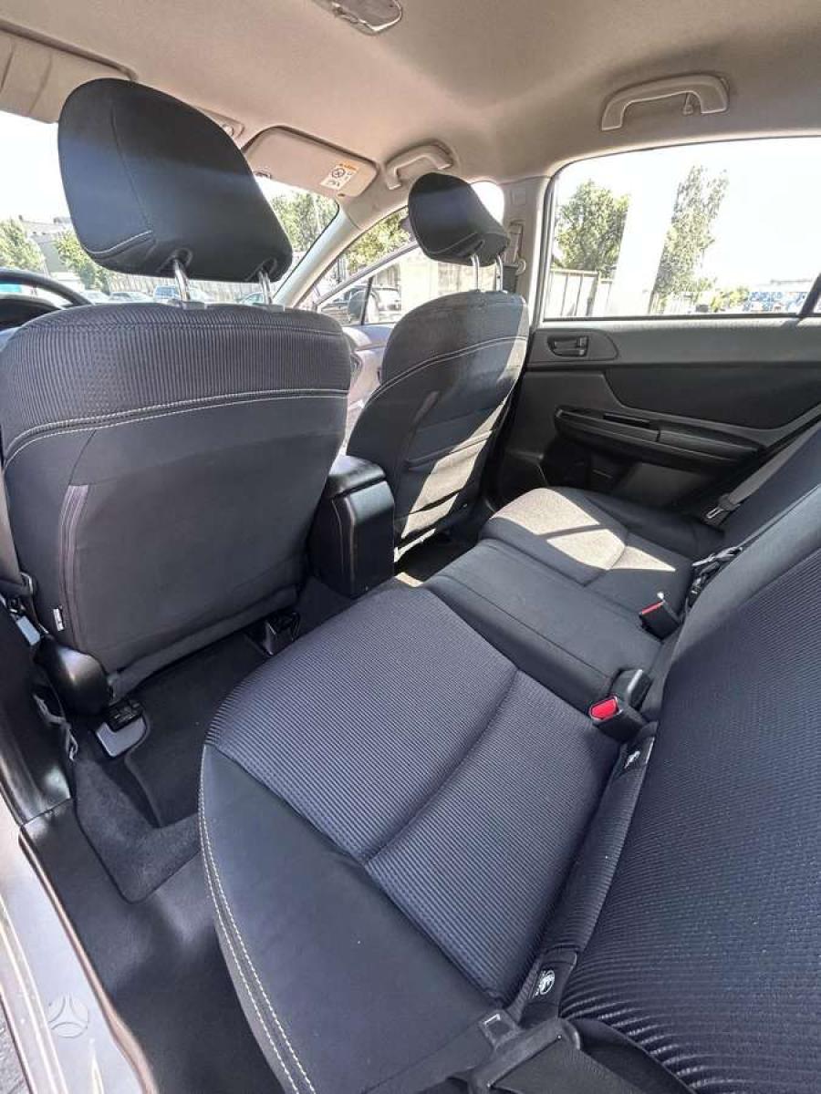 White Subaru XV 2014 in Vilnius, with an engine capacity of 2.00 L and mileage of 169 thousand km for 7499 €, photo 15 on AUTOMOTO.COM.LV