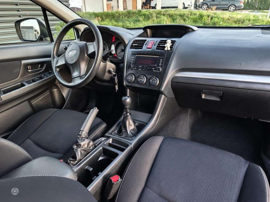 White Subaru XV 2014 in Vilnius, with an engine capacity of 2.00 L and mileage of 189 thousand km for 6850 €, photo 9 on AUTOMOTO.COM.LV