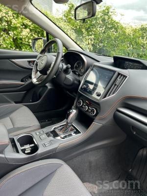 White Subaru XV 2023 in Riga, with an engine capacity of 1.60 L and mileage of 56 thousand km for 21000 €, photo 4 on AUTOMOTO.COM.LV