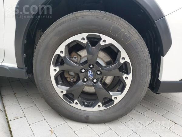 White Subaru XV 2023 in Riga, with an engine capacity of 1.60 L and mileage of 73 thousand km for 23300 €, photo 6 on AUTOMOTO.COM.LV