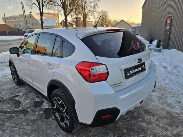 White Subaru XV 2012 in Siauliai, with an engine capacity of 2.00 L and mileage of 241 thousand km for 7950 €, photo 5 on AUTOMOTO.COM.LV