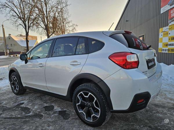 White Subaru XV 2012 in Siauliai, with an engine capacity of 2.00 L and mileage of 241 thousand km for 7950 €, photo 6 on AUTOMOTO.COM.LV