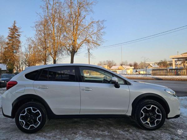 White Subaru XV 2012 in Siauliai, with an engine capacity of 2.00 L and mileage of 241 thousand km for 7950 €, photo 10 on AUTOMOTO.COM.LV