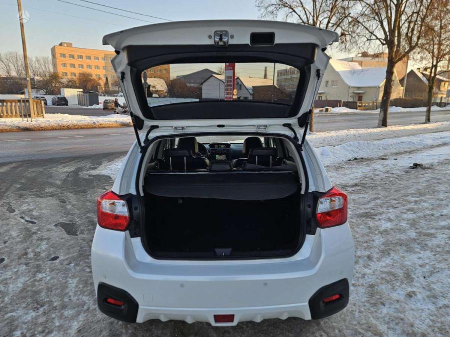 White Subaru XV 2012 in Siauliai, with an engine capacity of 2.00 L and mileage of 241 thousand km for 7950 €, photo 12 on AUTOMOTO.COM.LV
