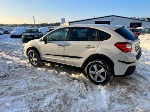 White Subaru XV 2012 in Utena, with an engine capacity of 2.00 L and mileage of 204 thousand km for 4599 €, photo 4 on AUTOMOTO.COM.LV