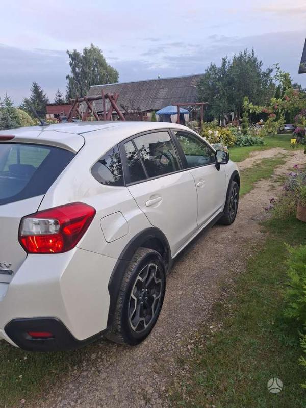 White Subaru XV 2012 in Svencionys, with an engine capacity of 1.96 L and mileage of 329 thousand km for 3700 €, photo 4 on AUTOMOTO.COM.LV