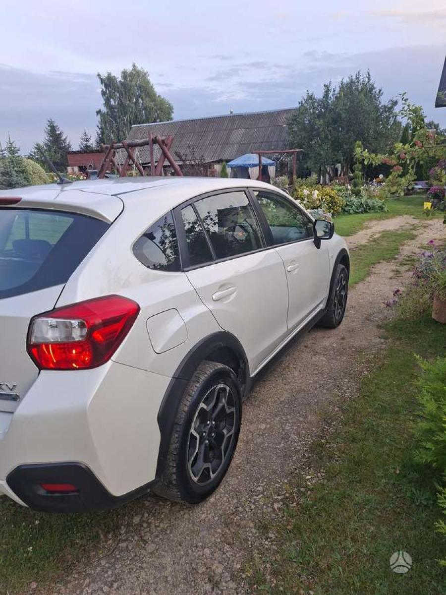 White Subaru XV 2012 in Svencionys, with an engine capacity of 1.96 L and mileage of 329 thousand km for 3700 €, photo 4 on AUTOMOTO.COM.LV