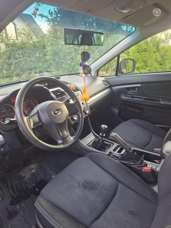 White Subaru XV 2012 in Svencionys, with an engine capacity of 1.96 L and mileage of 329 thousand km for 3700 €, photo 9 on AUTOMOTO.COM.LV
