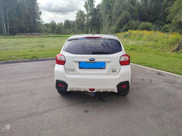 White Subaru XV 2013 in Siauliai, with an engine capacity of 2.00 L and mileage of 220 thousand km for 6500 €, photo 5 on AUTOMOTO.COM.LV